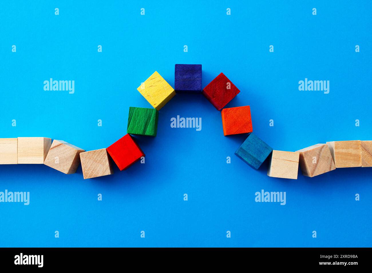 Colorful wooden cubes forming hi-res stock photography and images - Alamy