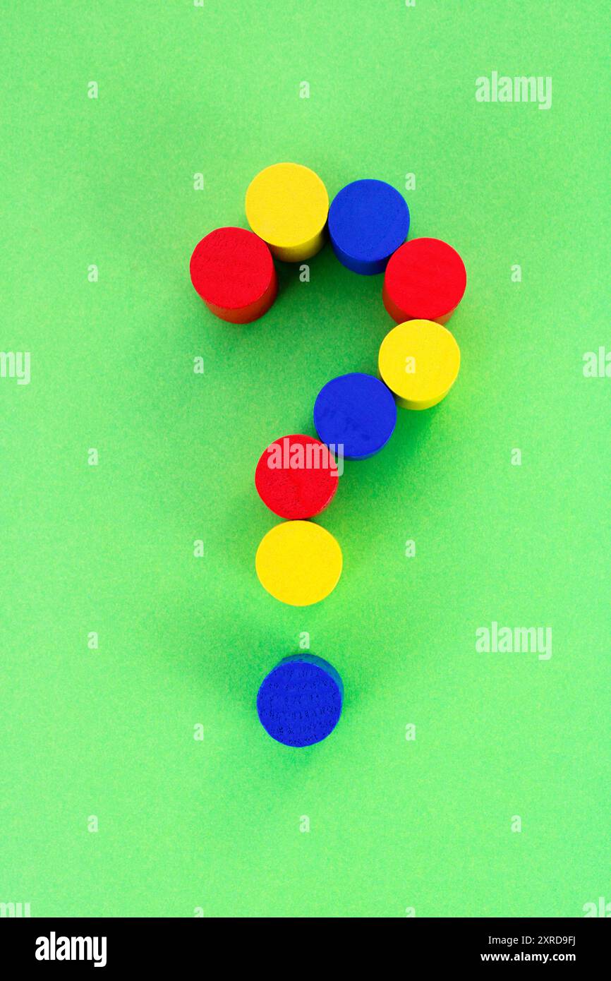 Question mark made from wooden cylinders Stock Photo - Alamy