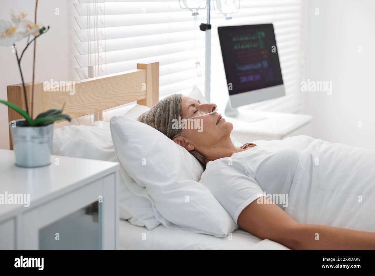 Coma patient mature woman hi-res stock photography and images - Alamy