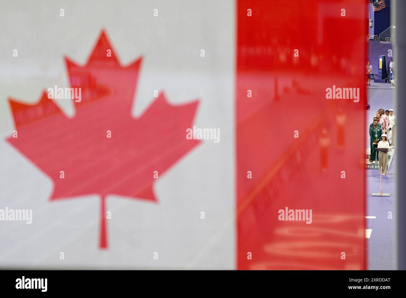 Members of Canada's gold medal men's 4 x 100 meter relay team, (top of ...