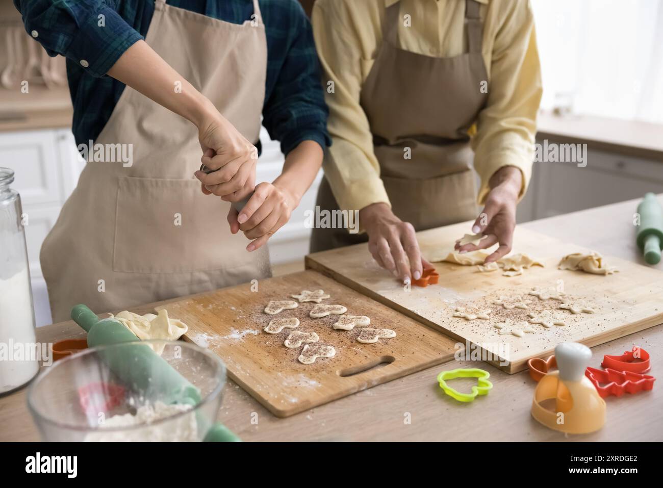 Baker cutting cookies cutter hi-res stock photography and images - Alamy