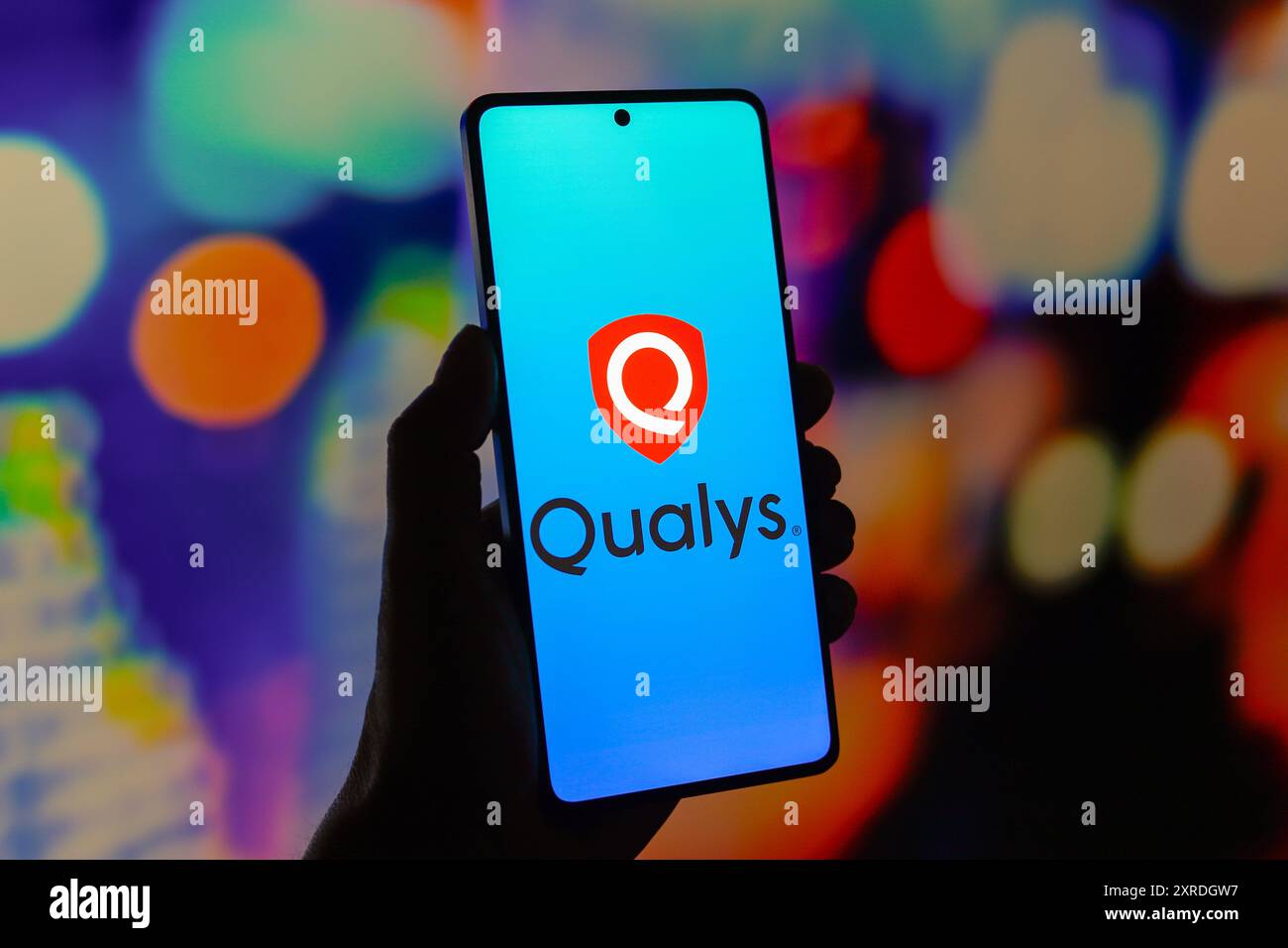 In this photo illustration, the Qualys, Inc. logo is displayed on a ...