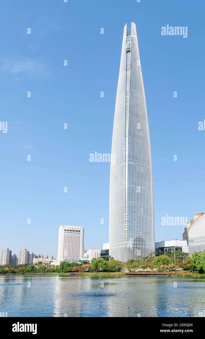 White skyscraper by lake at downtown. Seoul, South Korea Stock Photo ...