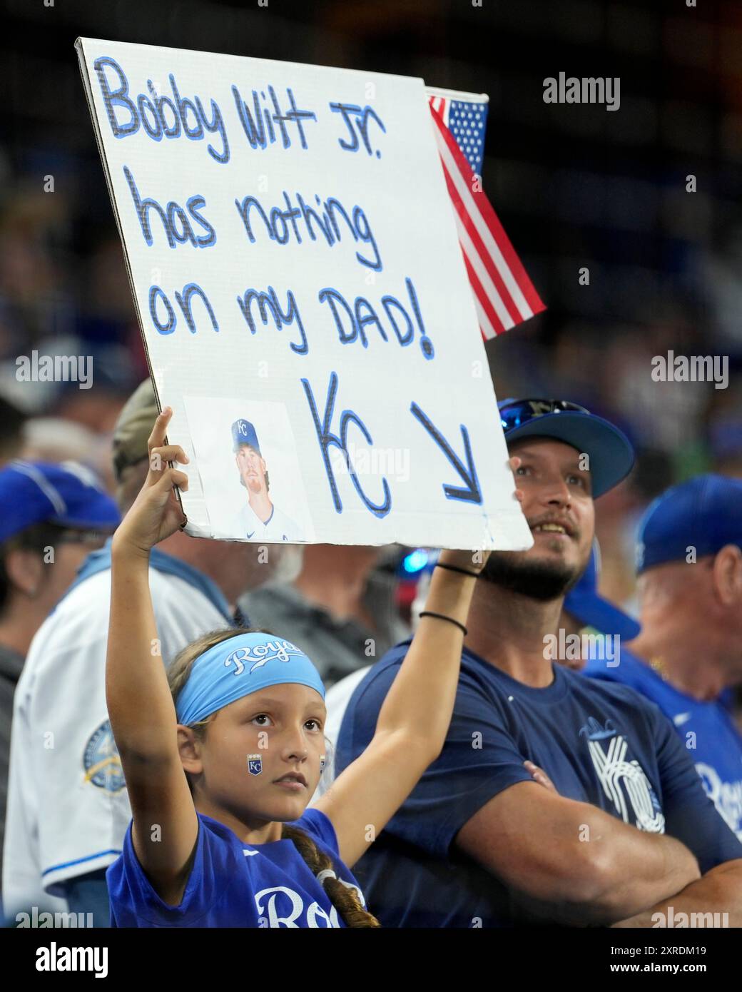 AUG 9, 2024: Fan celebrates her dad at Kauffman Stadium Kansas City ...