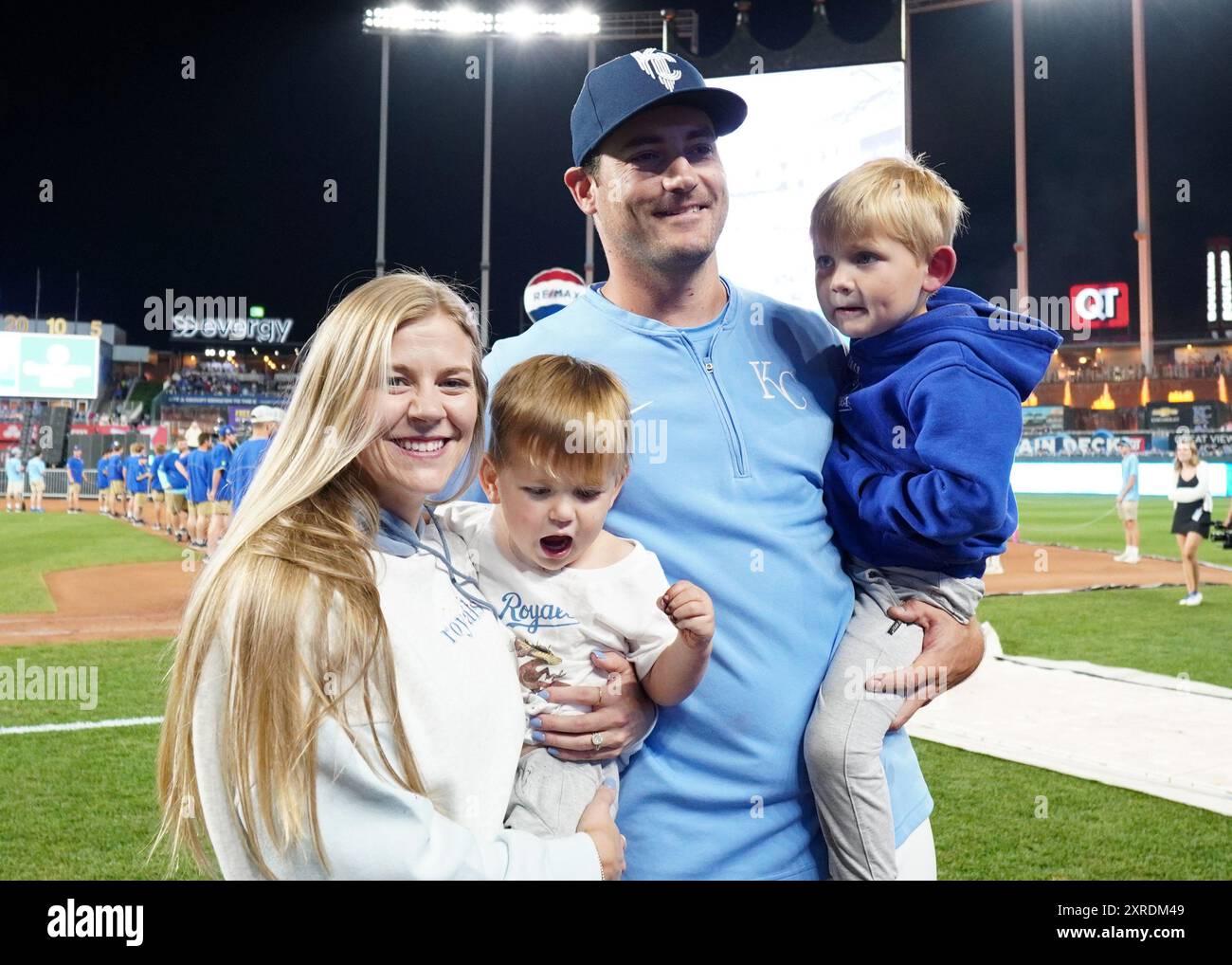 AUG 9, 2024: Royals ace Seth Lugo poses with his family post game at ...
