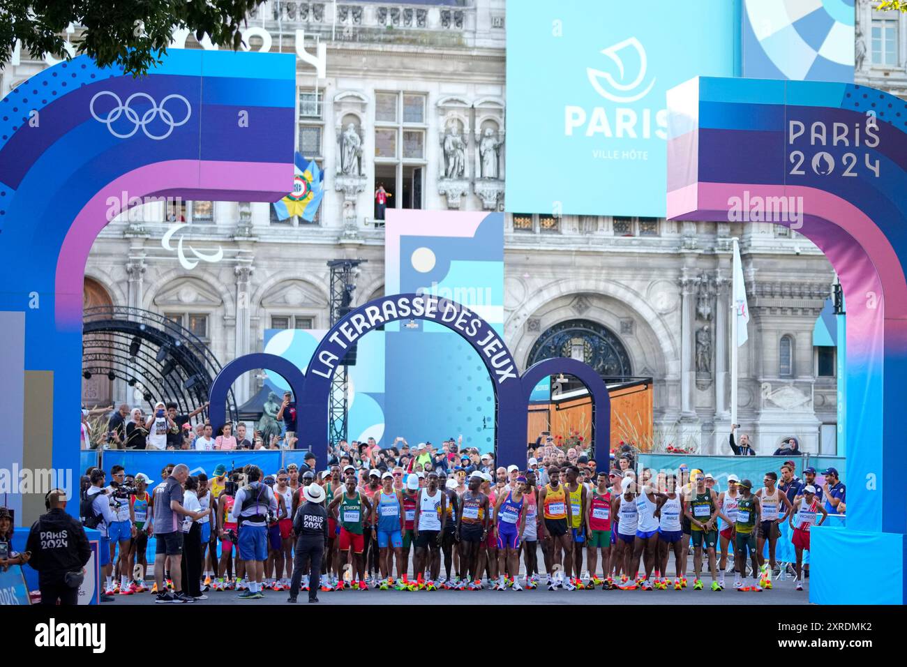 Athletes line up at the start of the men's marathon competition at the ...