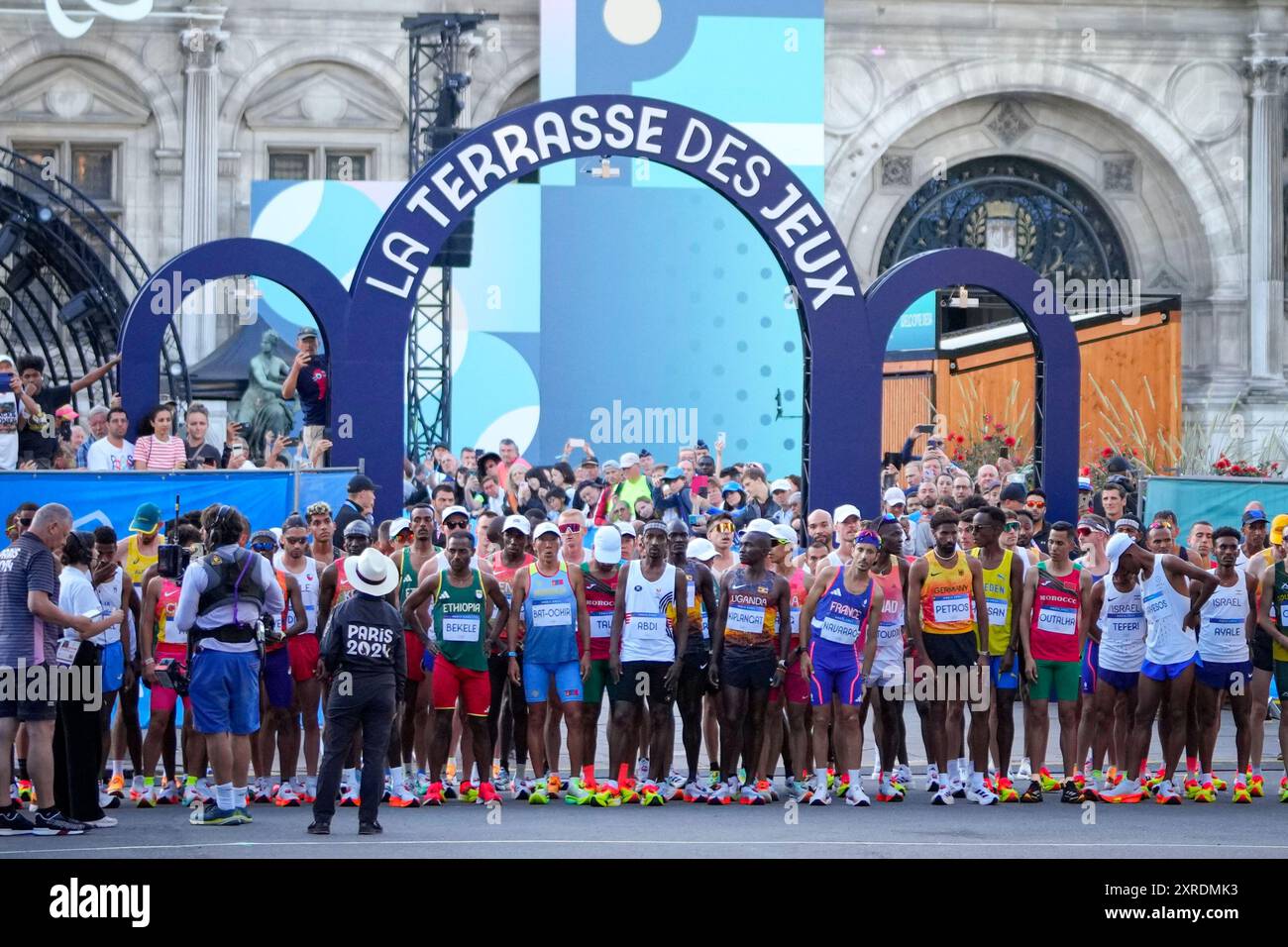 Athletes line up at the start of the men's marathon competition at the ...