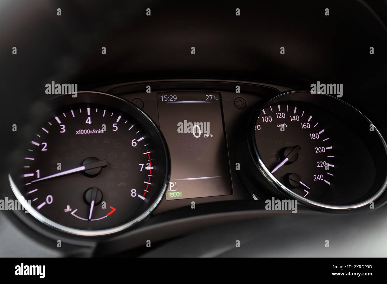 Close-up of round dashboard, speedometer and tachometer with white ...