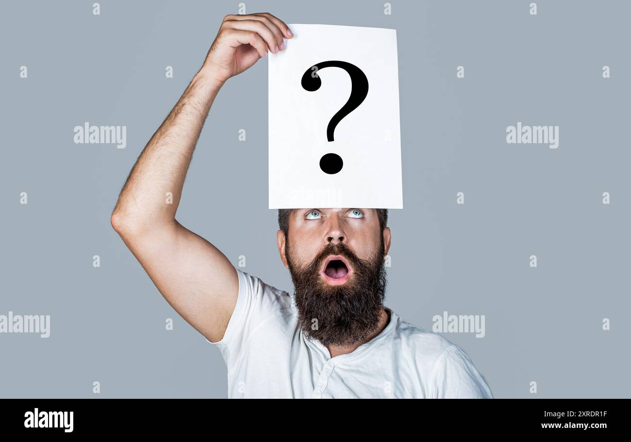 Thinking man with question mark on gray background. Man with question ...