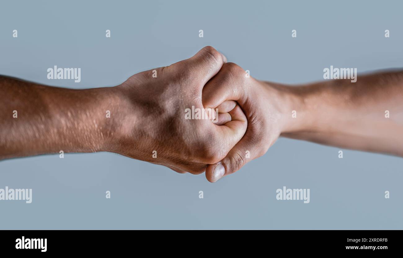 Handshake, arms, friendship. Friendly handshake, friends greeting, teamwork friendship. Rescue ...