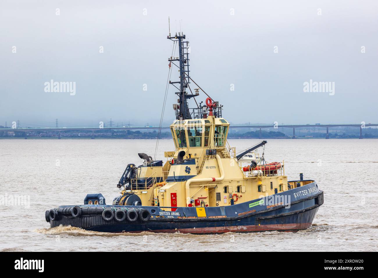 Tug waiting on the arrival of bulk carrier Etron as it approaches ...