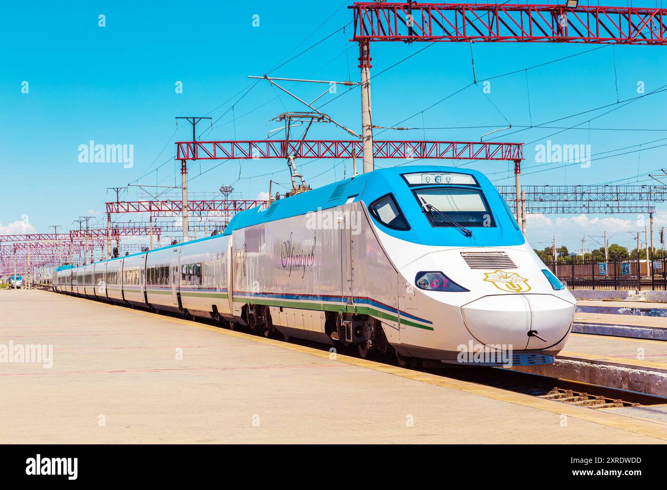 High-speed passenger express "Afrosiyob" at the platform of Bukhara ...