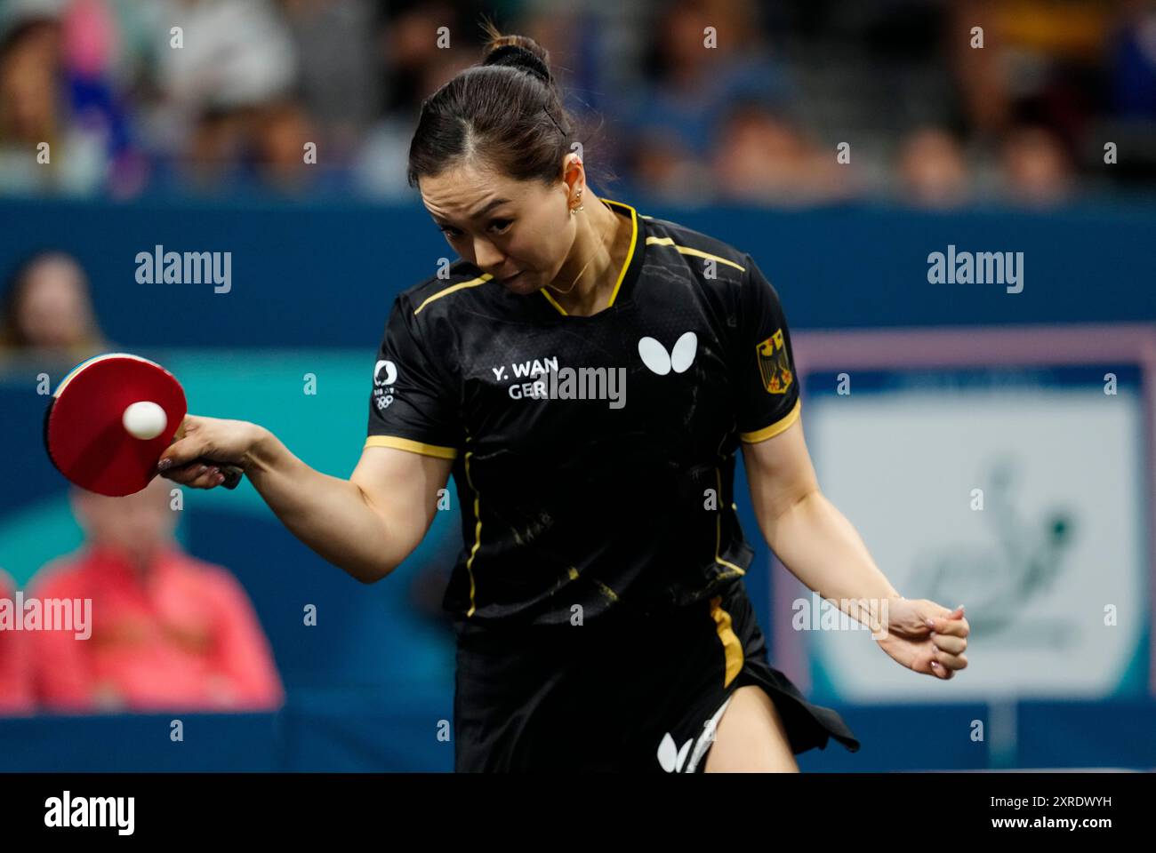 Germany's Yuan Wan, with her teammate Xiaona Shan, plays against South Korea's Shin Yubin and ...