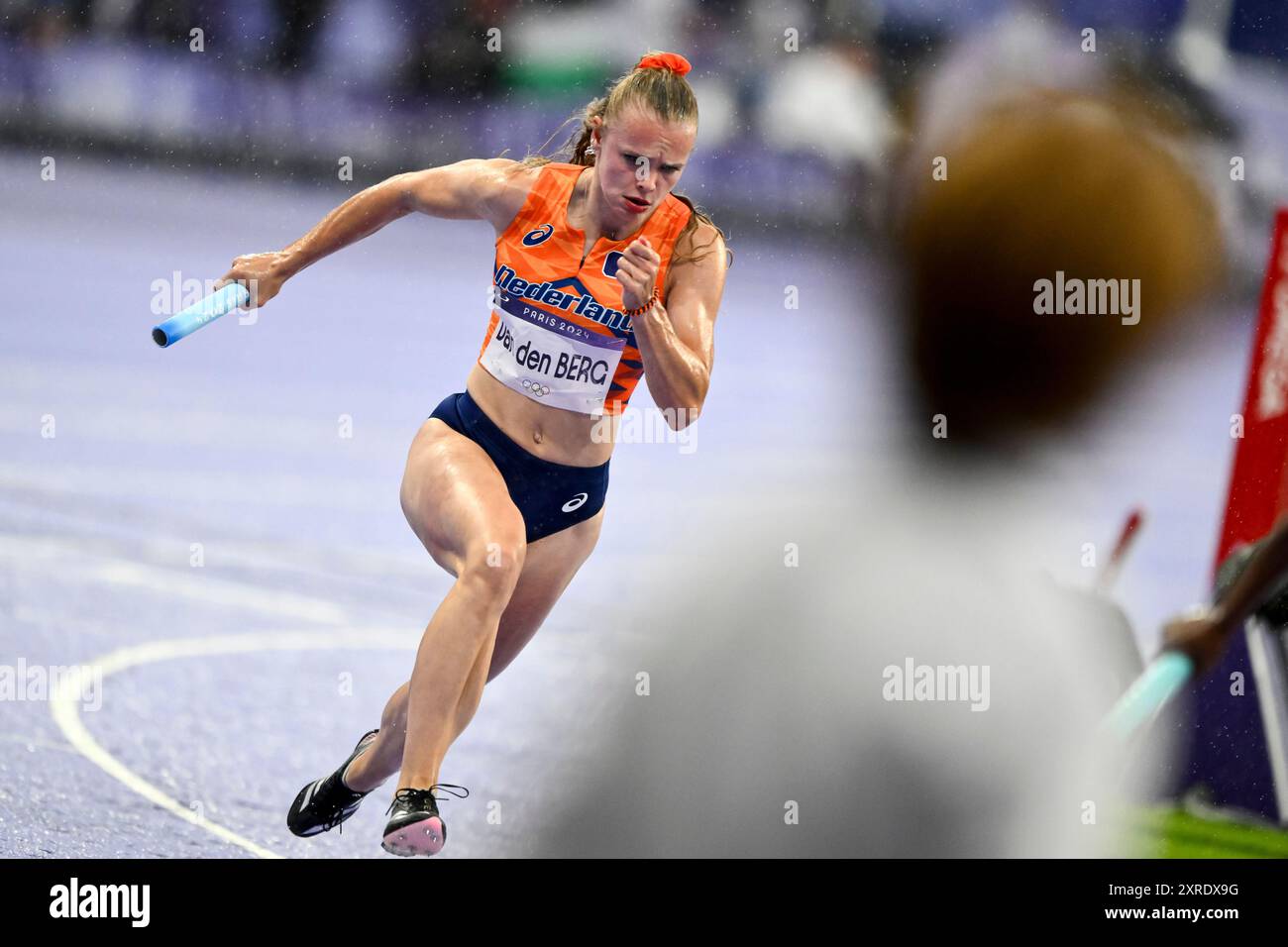 Isabel Van Den Berg of Netherlands competes in the Women's 4 x 100m ...