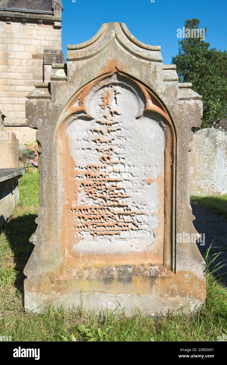Effects of weathering on a stone headstone in Settle Holy Ascension ...