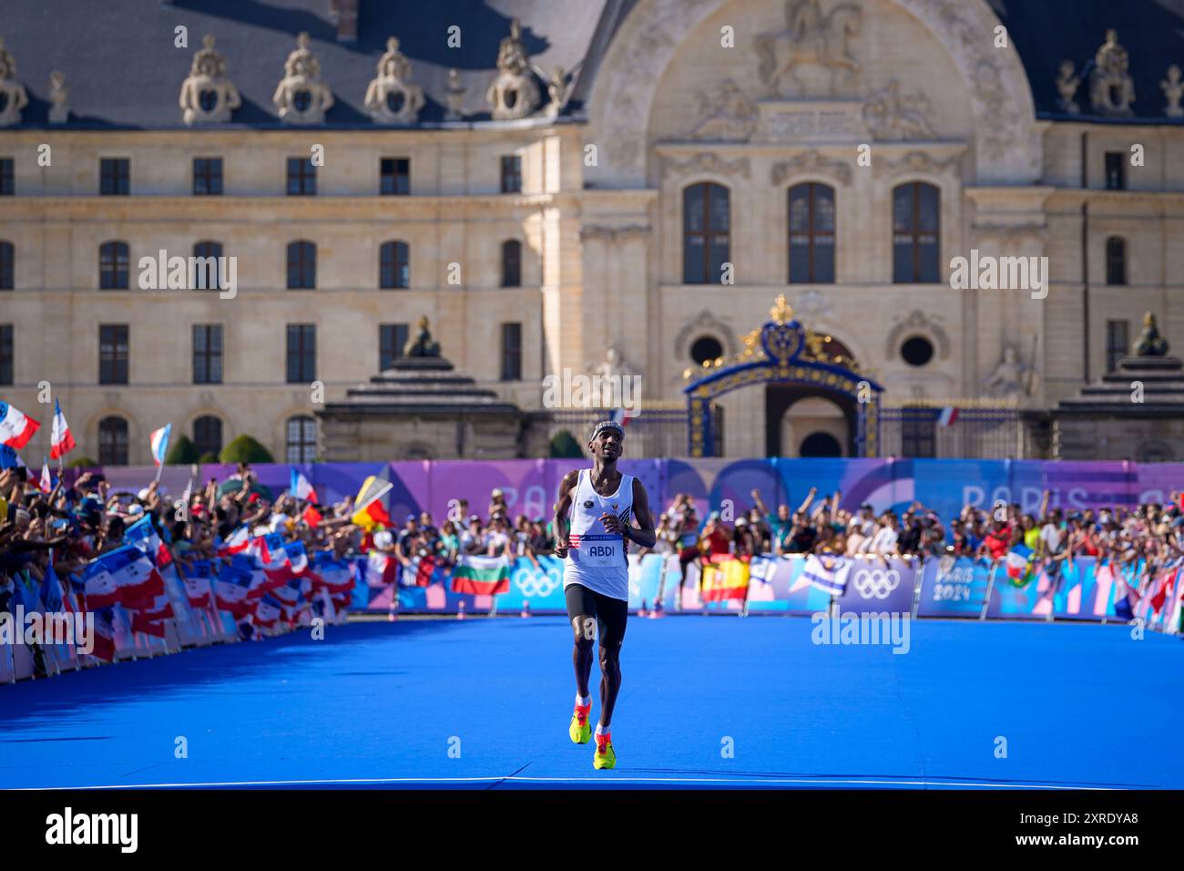 Belgium's Bashir Abdi approaches the finish line to win the silver ...