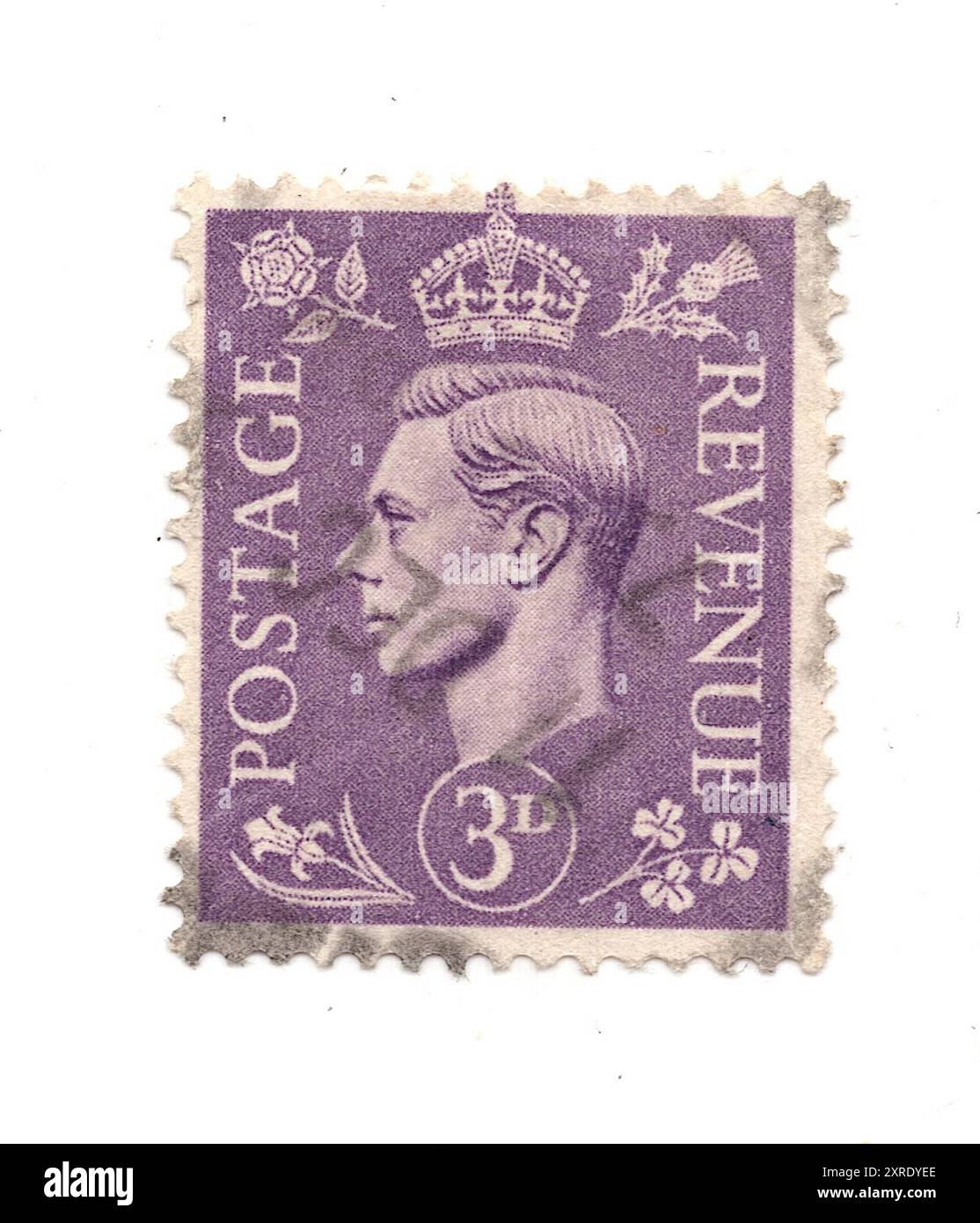 A vintage king George VI postage stamp from Great Britain on a white ...