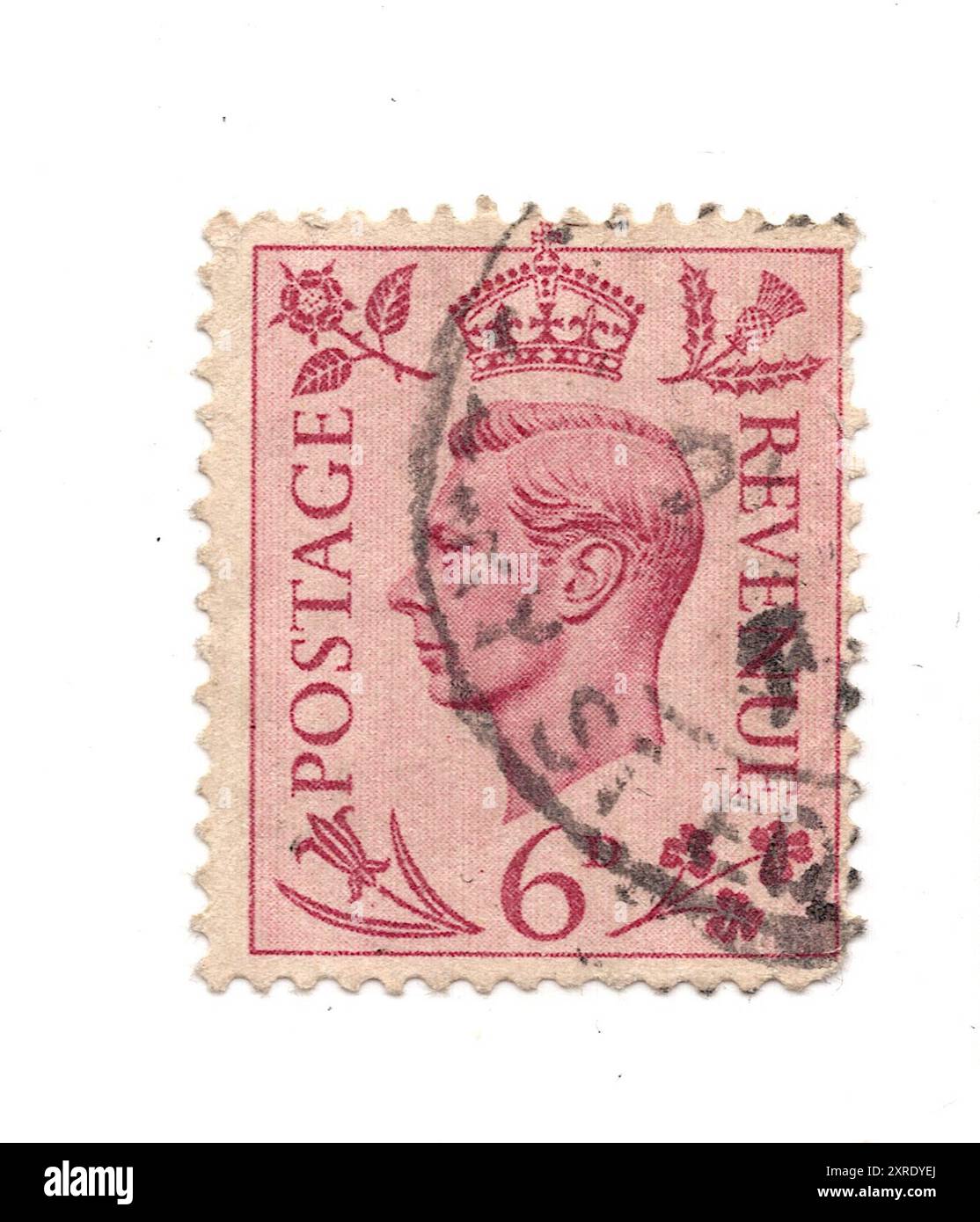 A vintage king George VI postage stamp from Great Britain on a white ...