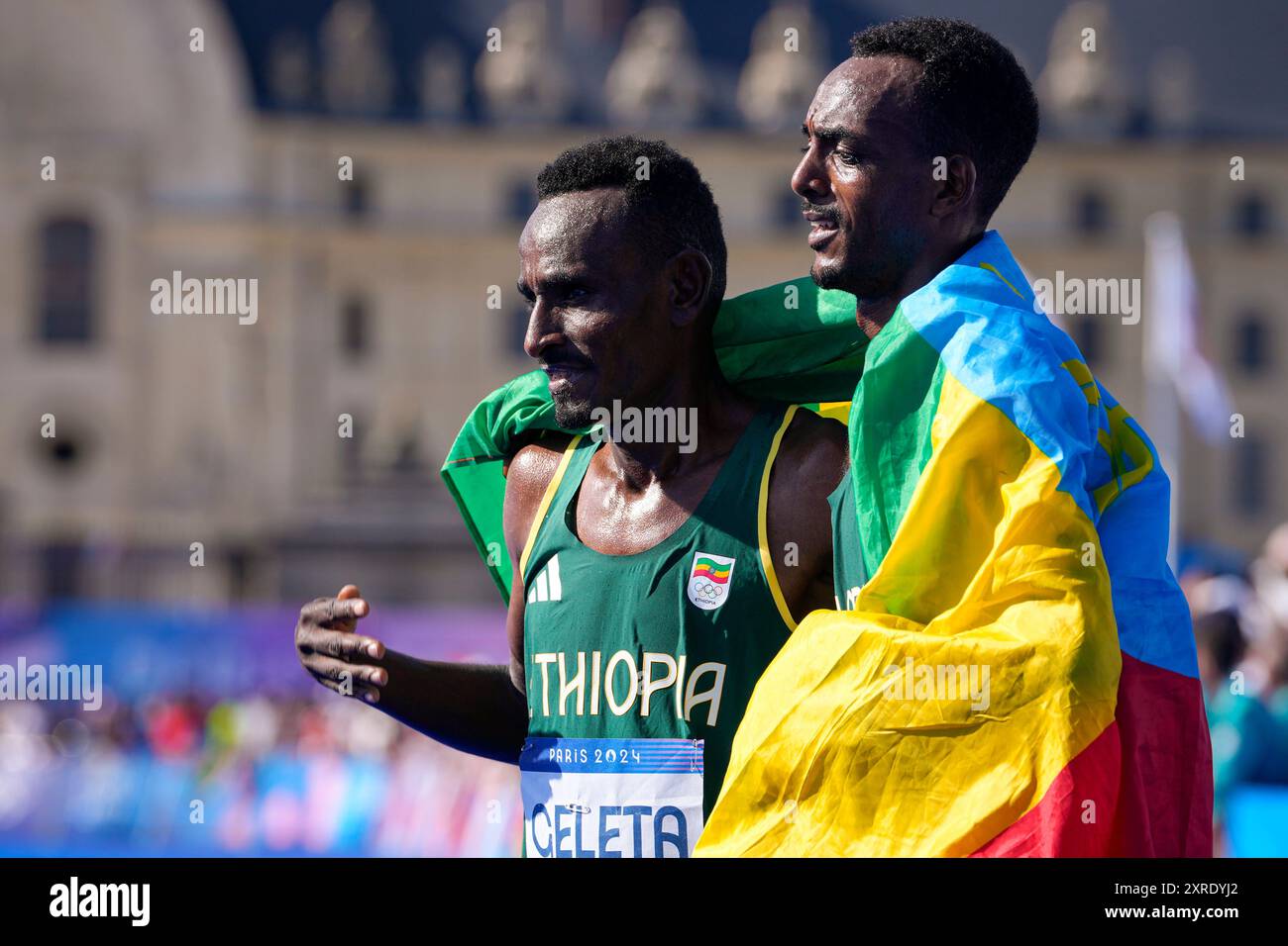 Ethiopia's Deresa Geleta, left, and Ethiopia's Tamirat Tola, right ...