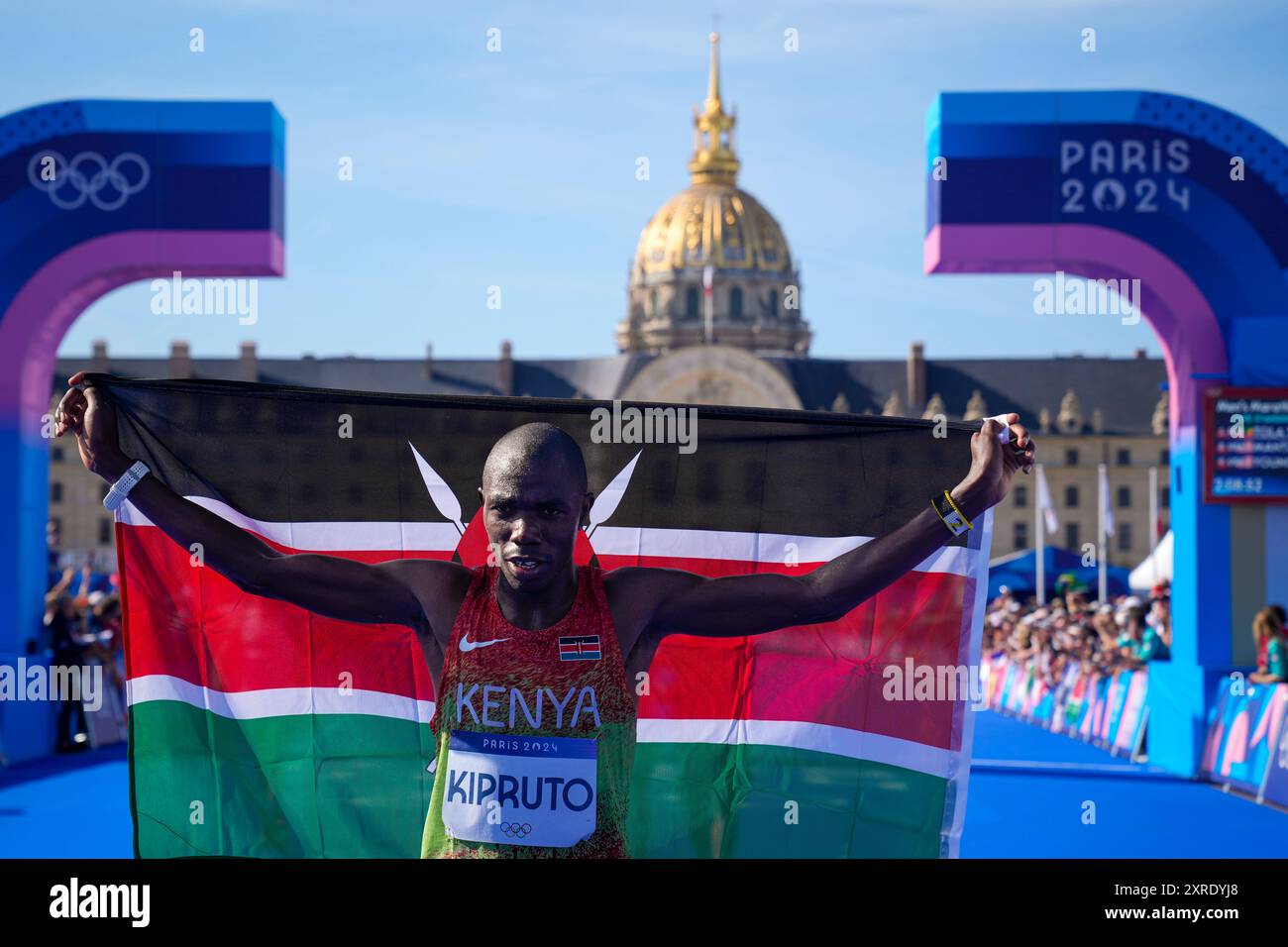 Bronze medalist Kenya's Benson Kipruto celebrates after crossing the ...