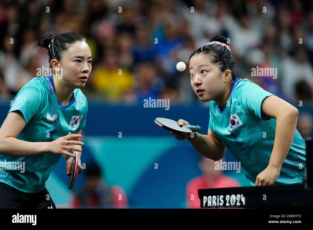 South Korea's Shin Yubin, right, and Jeon Jihee play against Germany's ...