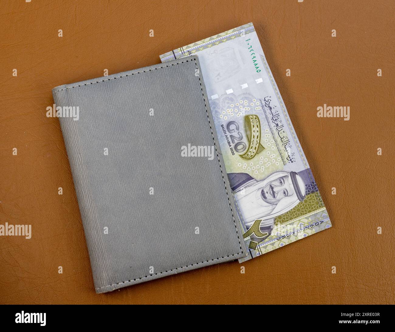 Saudi Arabia 20 riyal banknote features King Salman and logo of G20 in ...