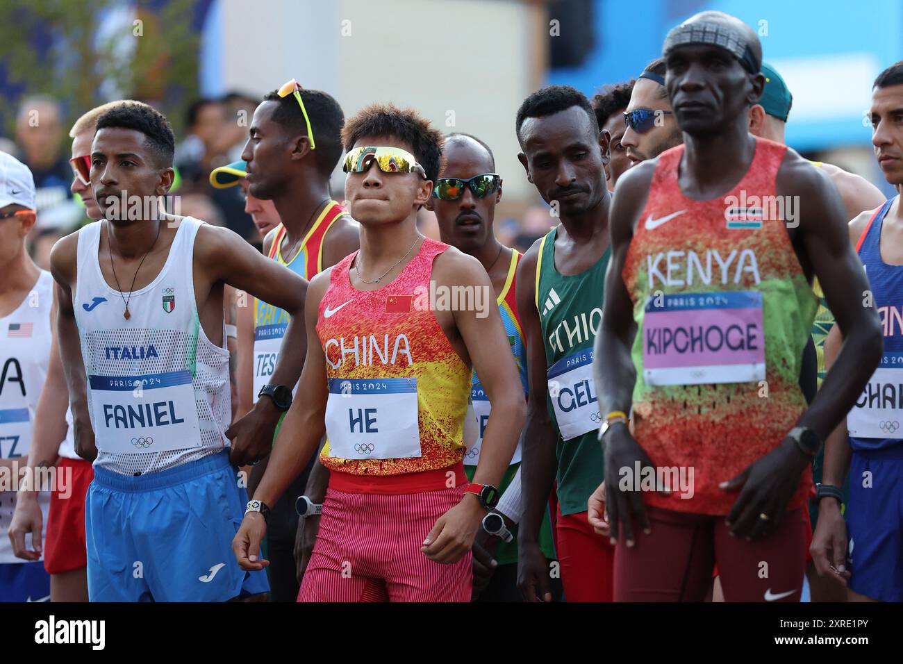 Paris, France. 10th Aug, 2024. He Jie (C) of China reacts before the ...
