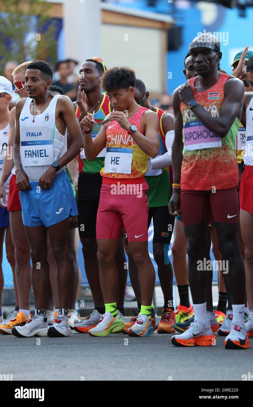 Paris, France. 10th Aug, 2024. He Jie (C) of China reacts before the ...