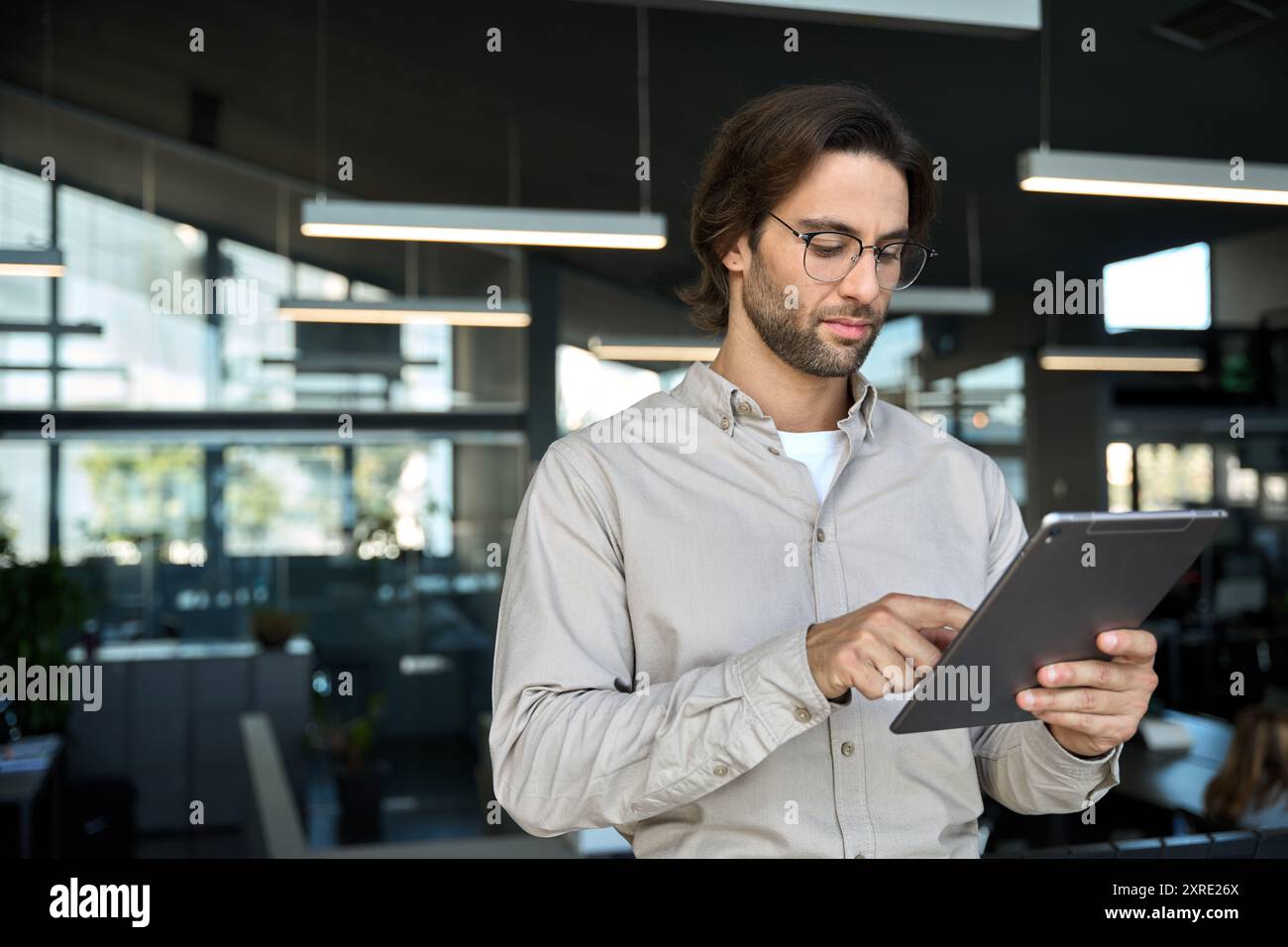 Business man thinking tablet hi-res stock photography and images - Alamy