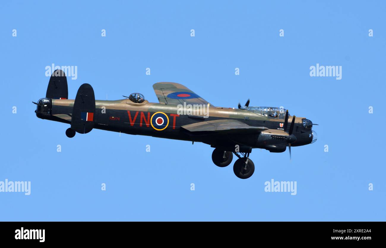 Vintage Avro Lancaster world war 2 bomber with wheels down in flight ...