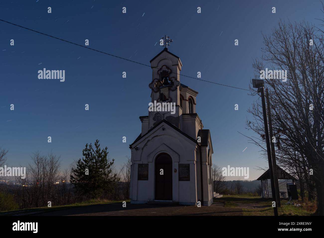 Orthodox church at night with star trails in sky Stock Photo - Alamy