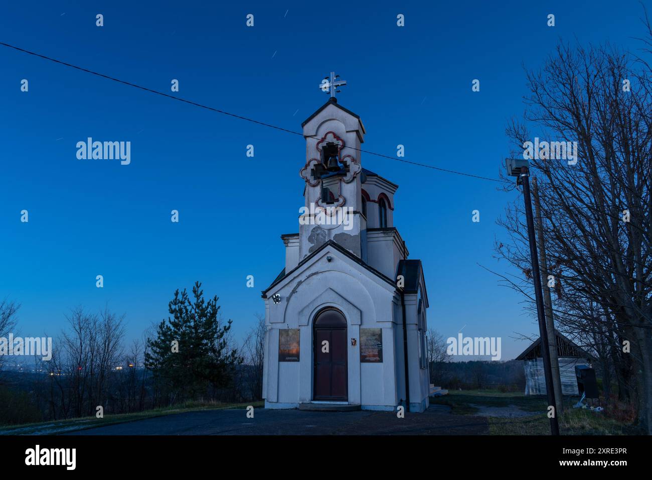 Orthodox church at night with star trails in sky Stock Photo - Alamy