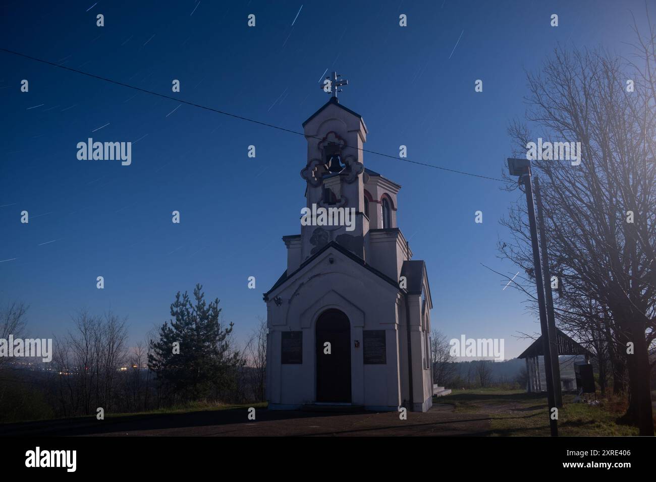 Orthodox church at night with star trails in sky Stock Photo - Alamy