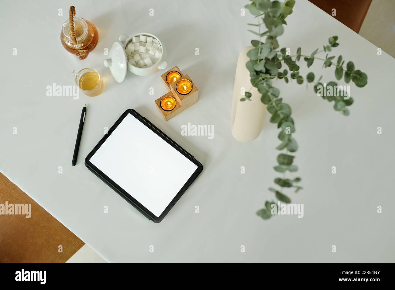 Digital Tablet On Dining Table Stock Photo - Alamy
