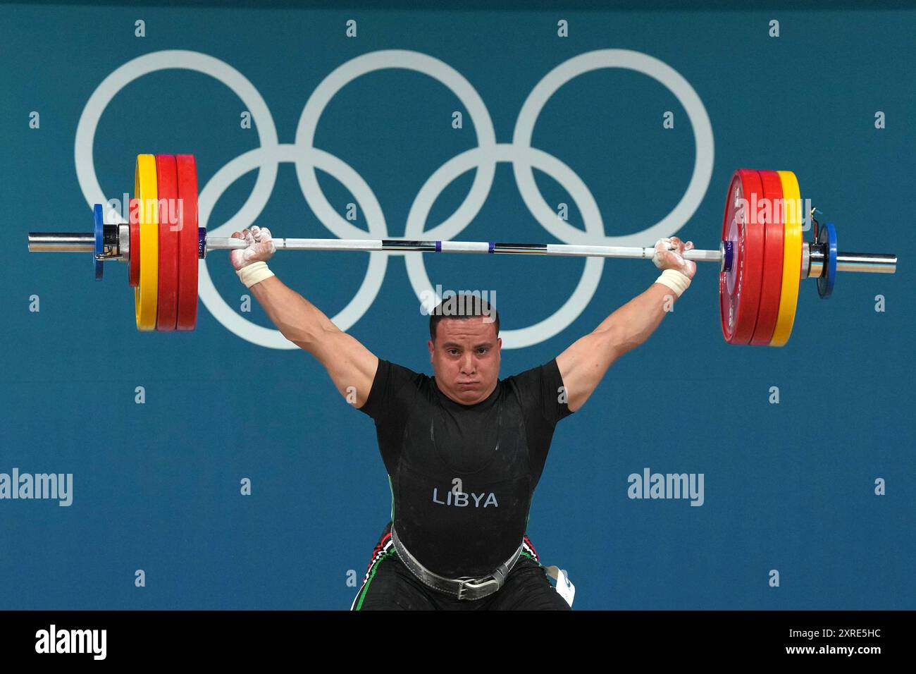 Ahmed Abuzriba of Libya competes during the men's 102kg weightlifting ...
