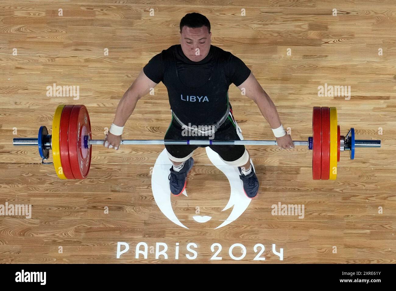 Ahmed Abuzriba of Libya competes during the men's 102kg weightlifting ...
