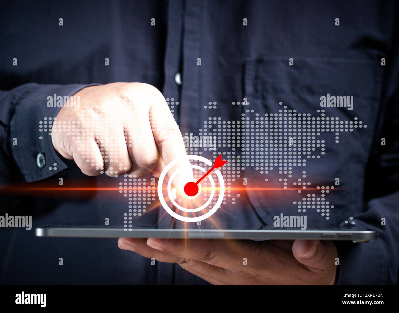 Business Man holding tablet pointing at marketing target. Business and ...