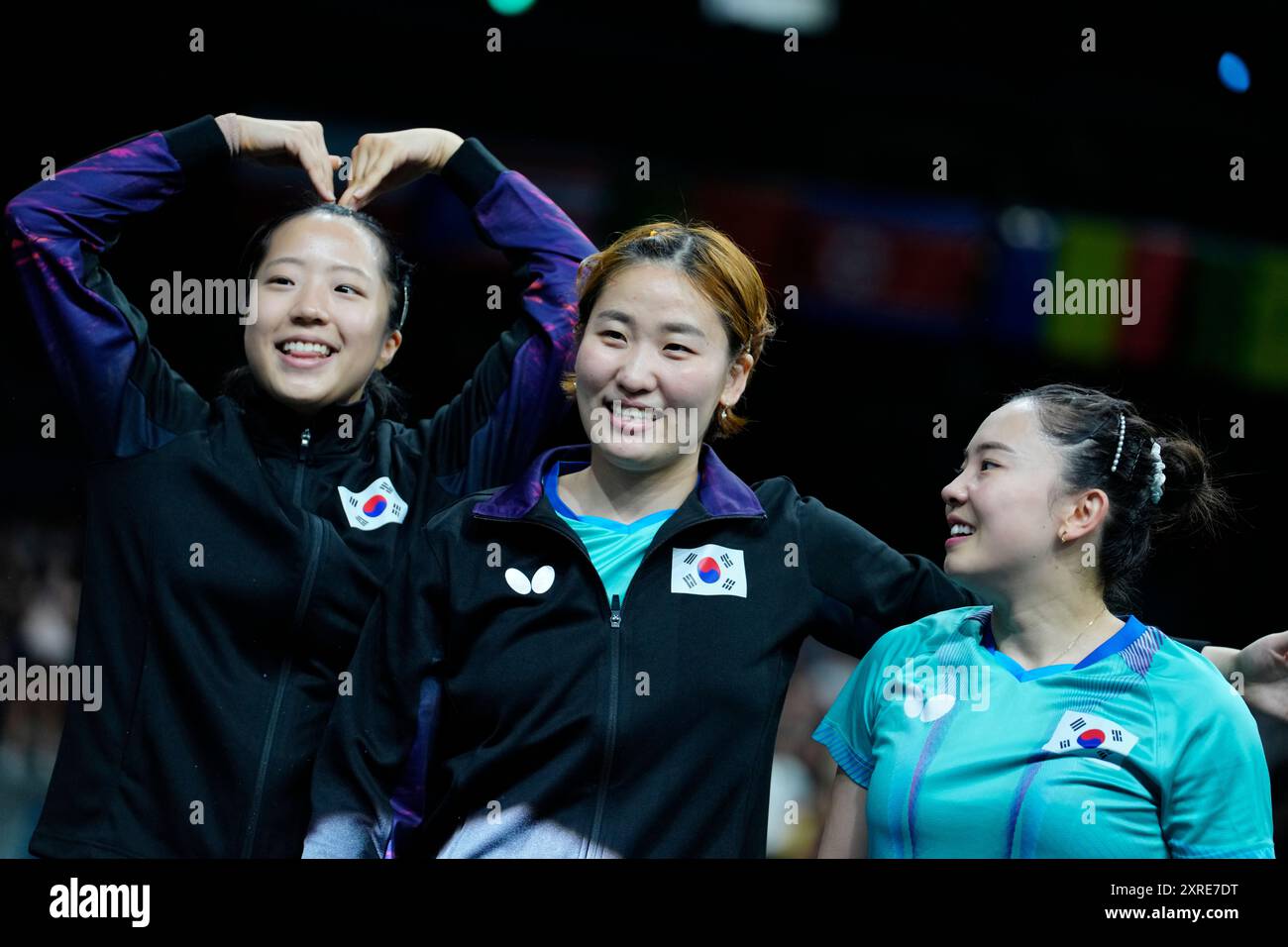 South Korea team celebrate after defeating Germany in the women's bronze medal team table tennis ...