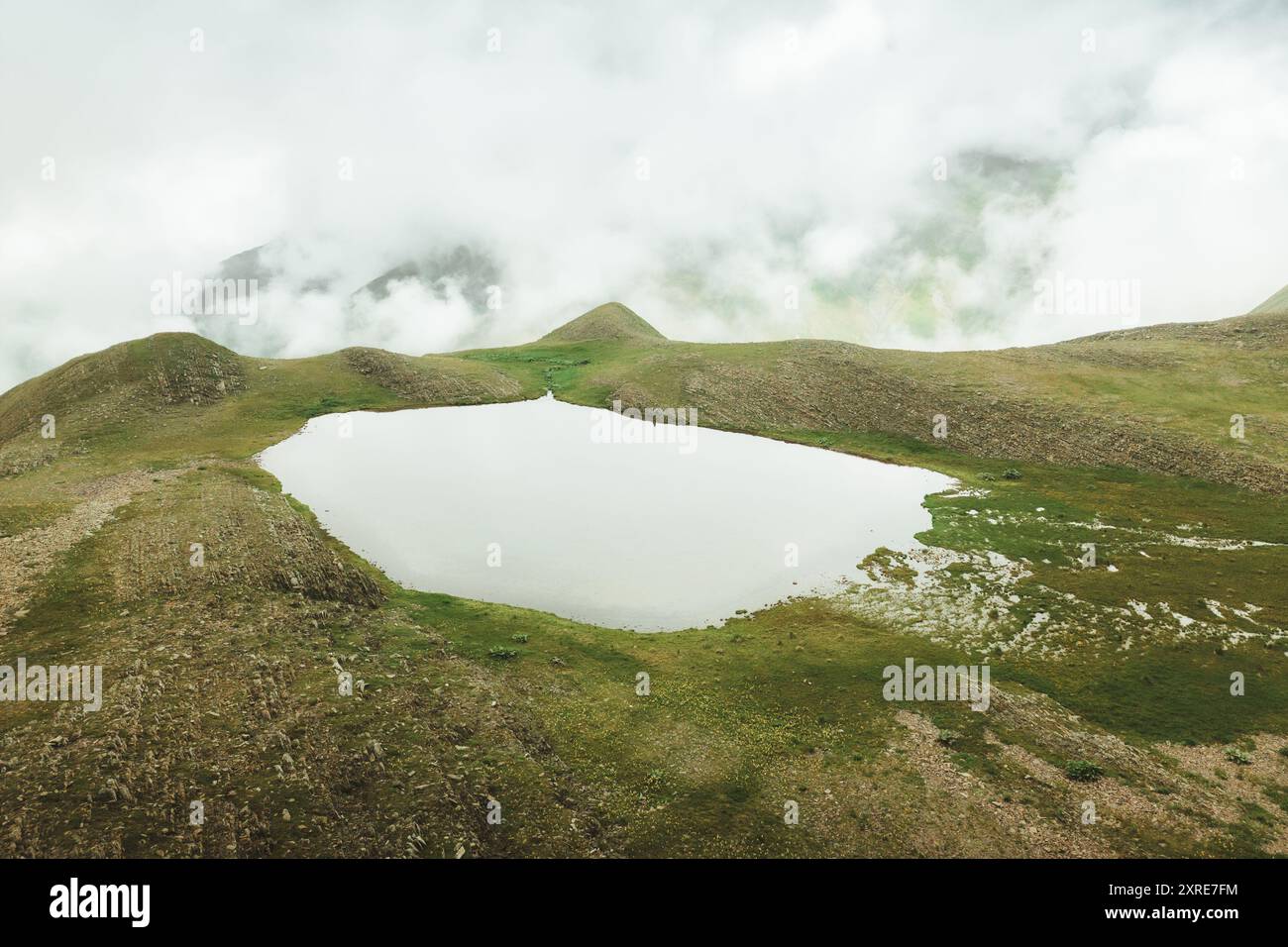Aerial side view alpine Chokhi Sakori Lake. Georgia country caucasus ...