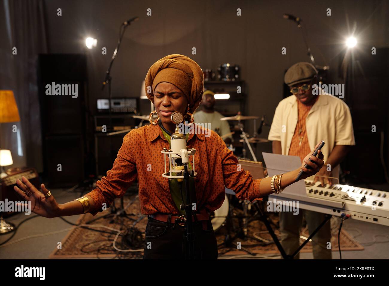 Musical group in recording studio hi-res stock photography and images ...