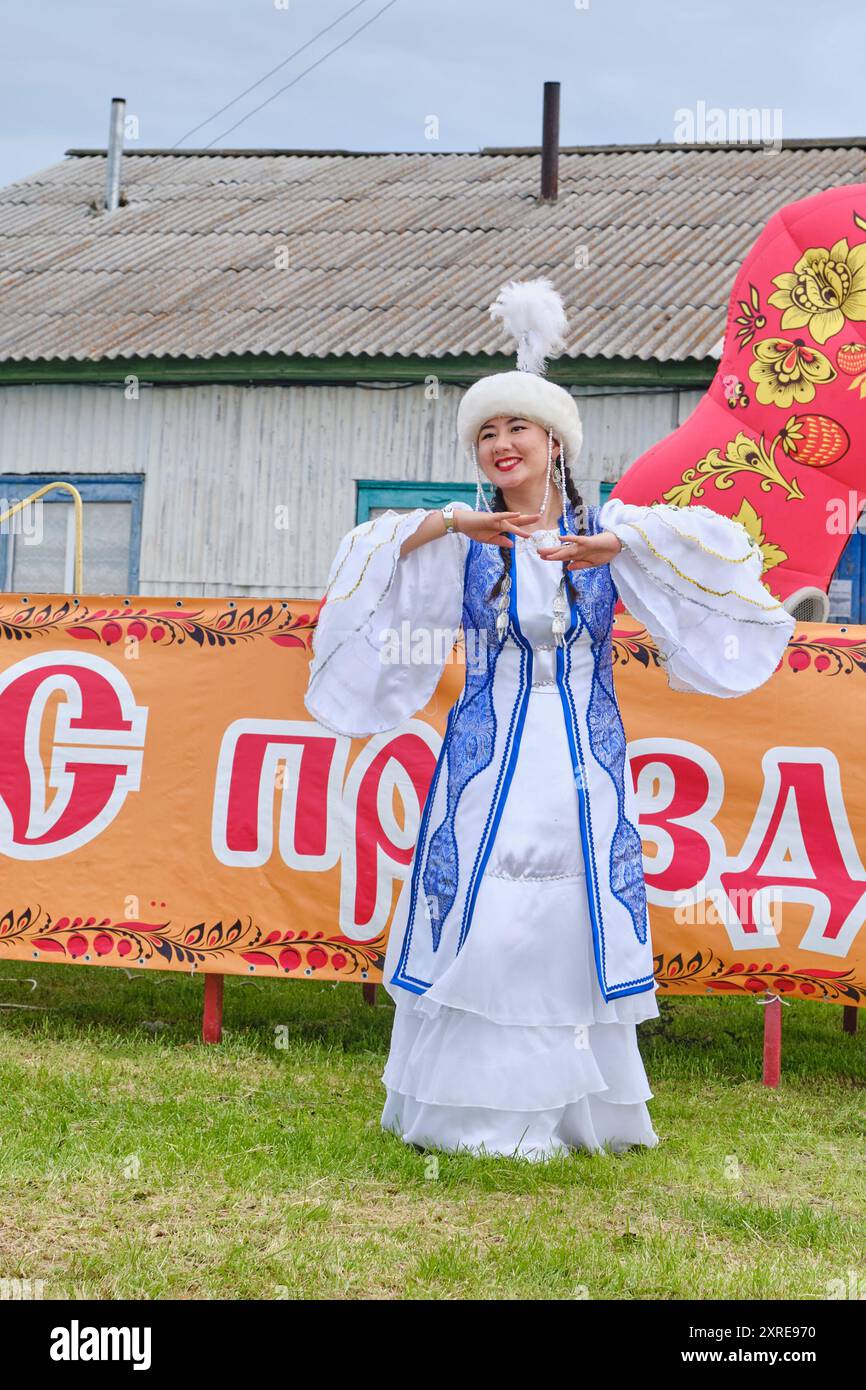 Tyumen, Russia - July 6, 2024: Happy smiling Asian girl in national ...