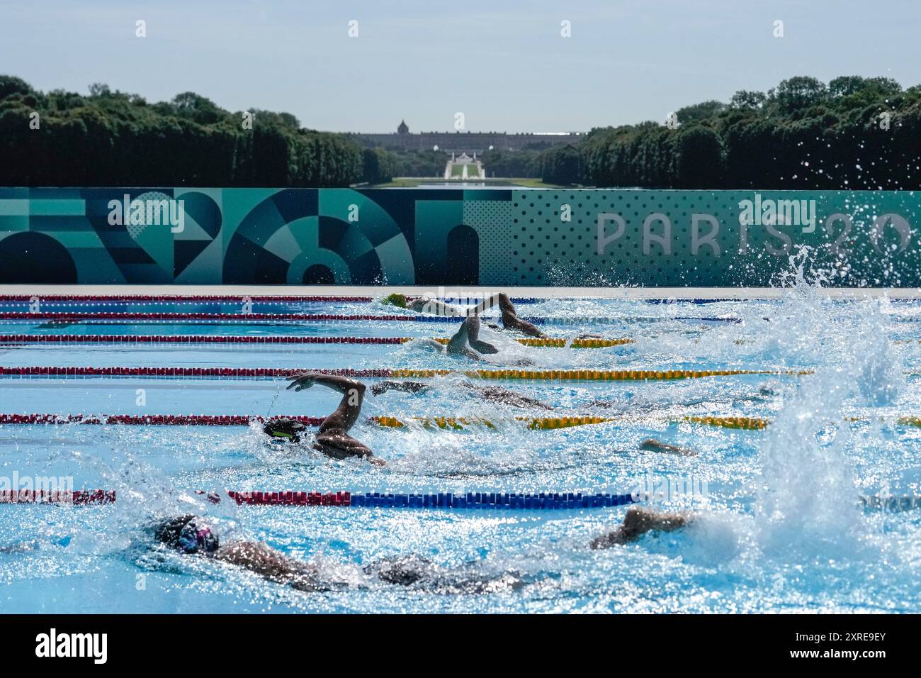 Swimmers compete in the women's individual swimming 200m freestyle ...