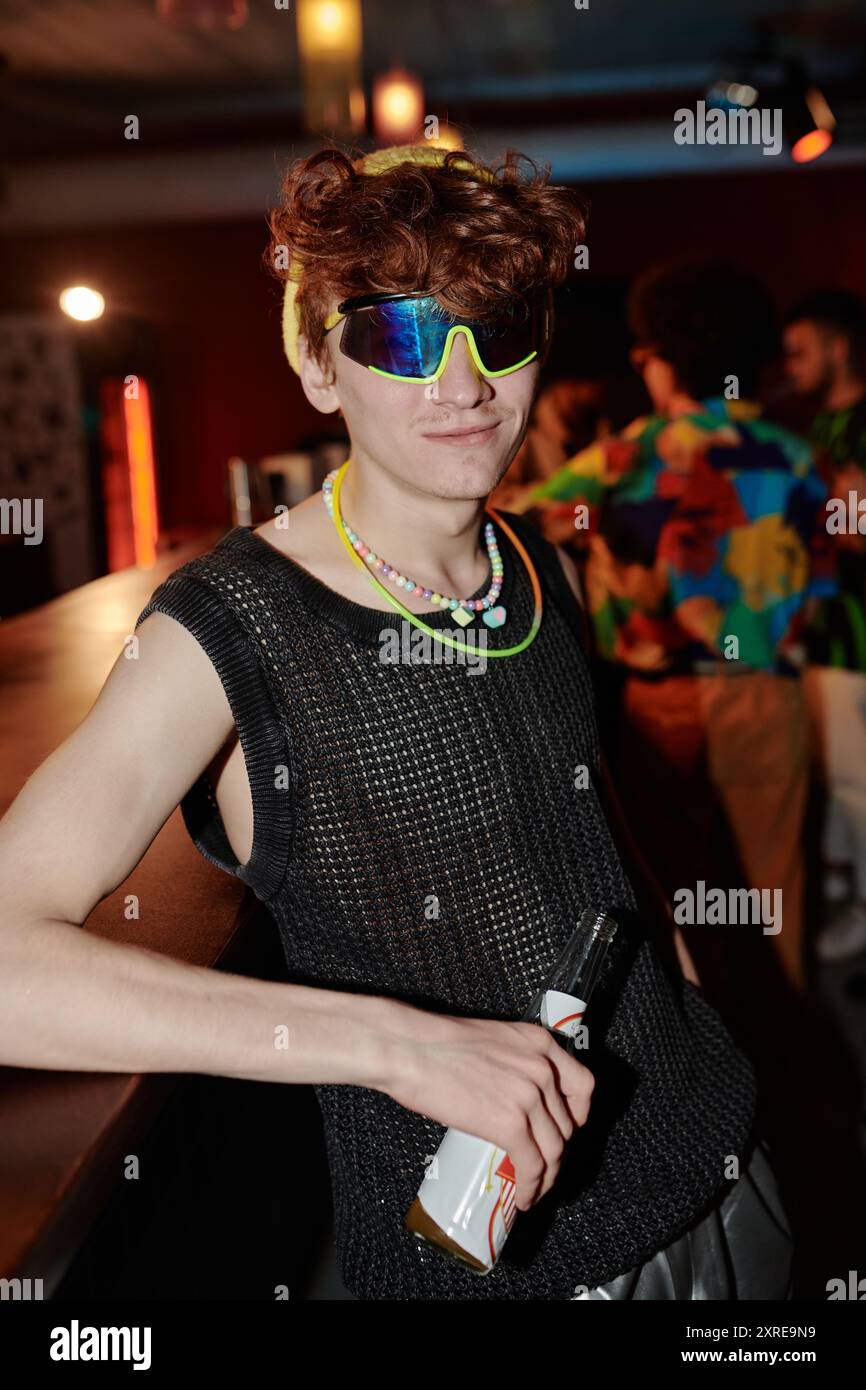 Guy in night club holding hi-res stock photography and images - Alamy