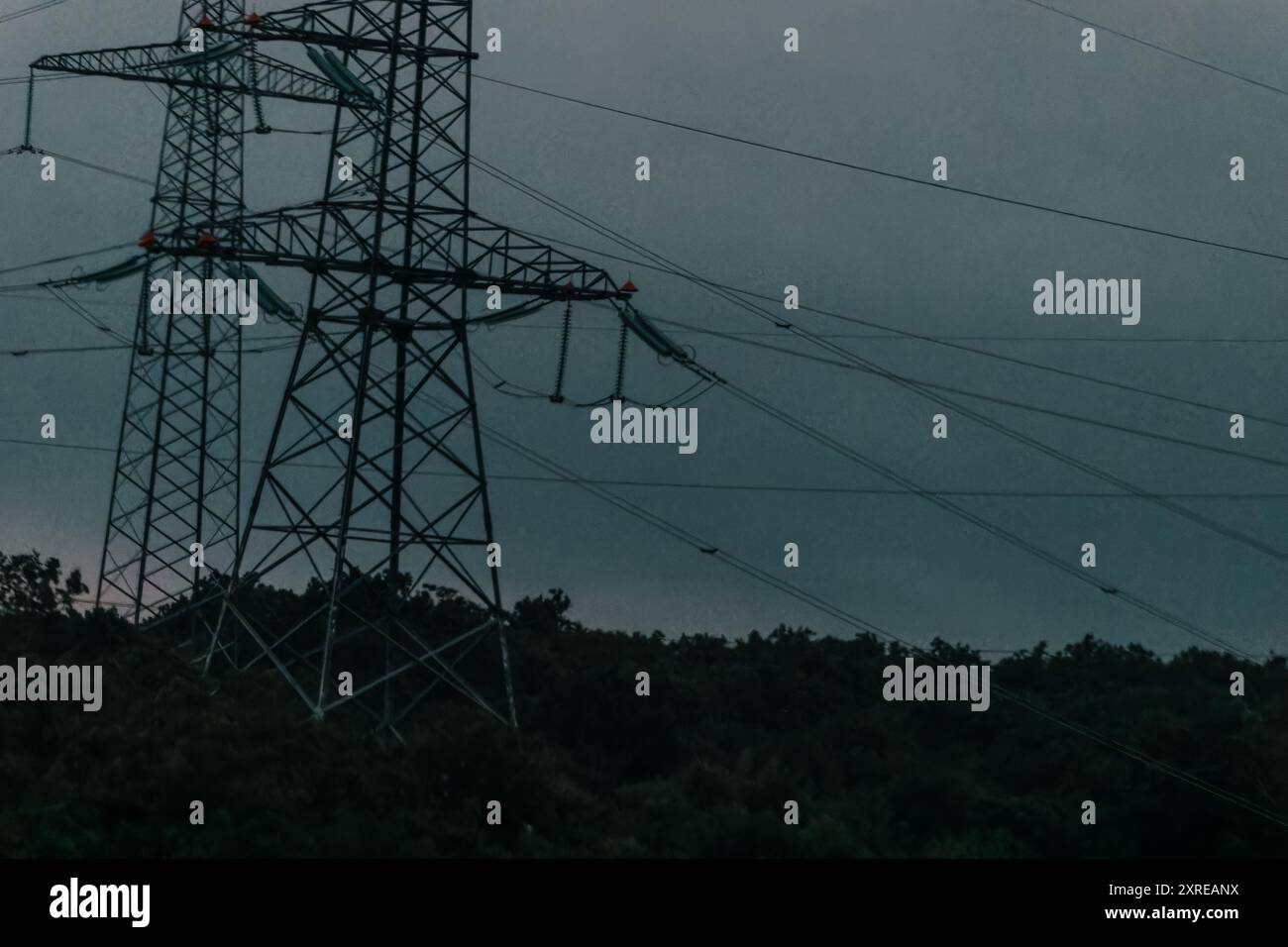 High voltage electric distribution network at sunset. Power ...