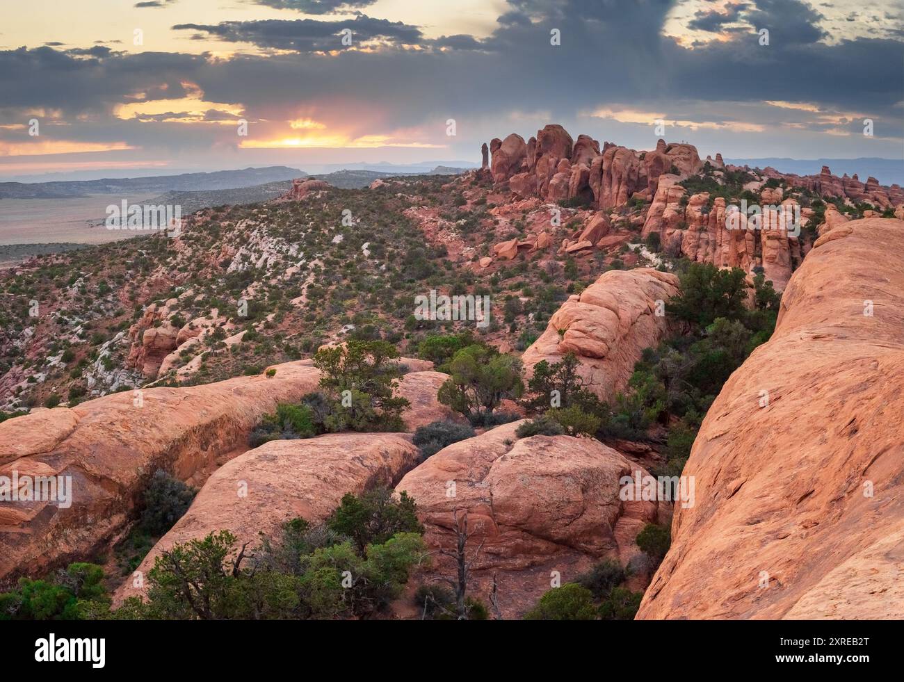 A stunning sunset view from Devils Garden Trail in Arches National Park ...