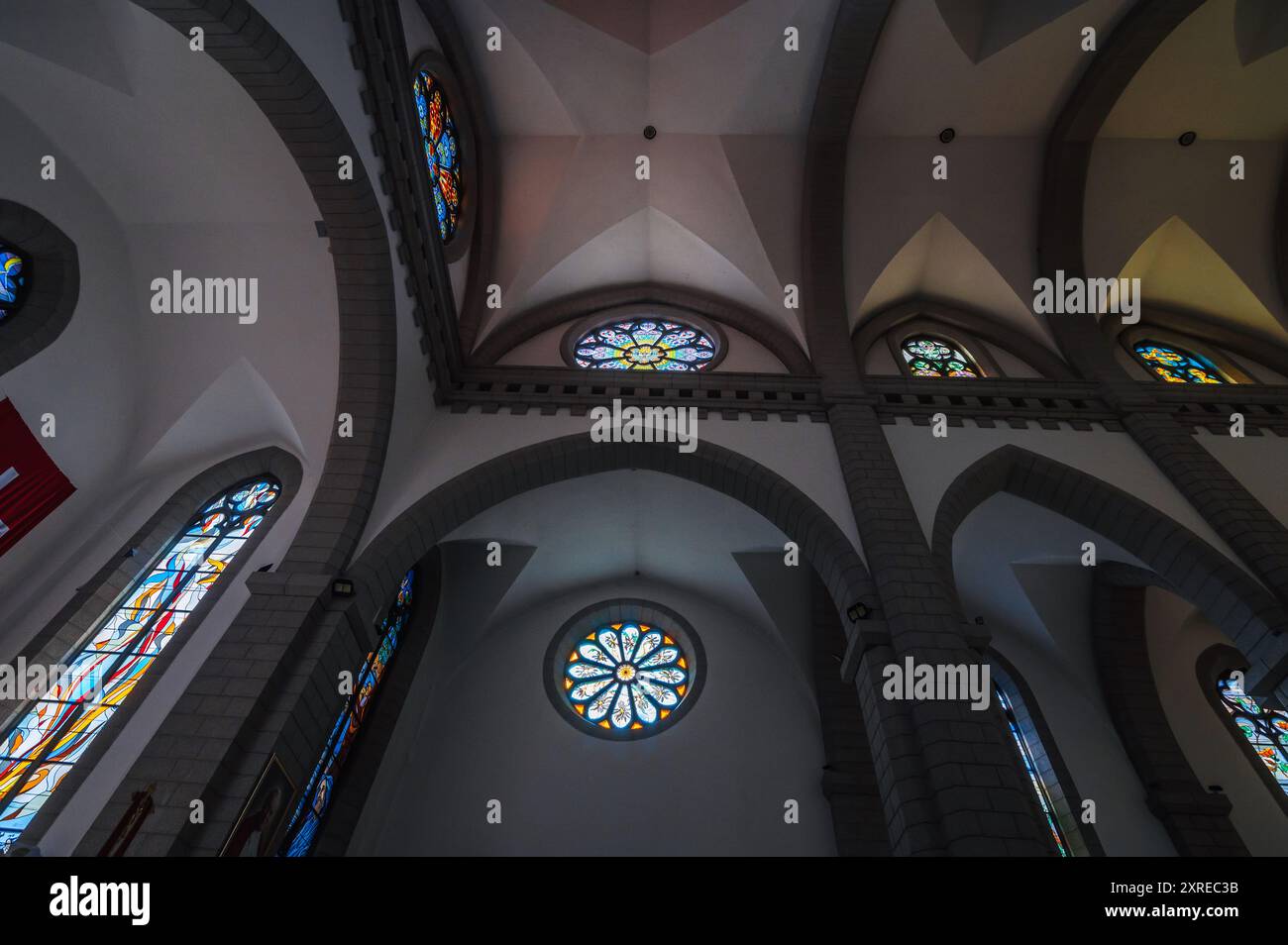 wall and ceiling inside the Catholic church with mosaics on the stained ...