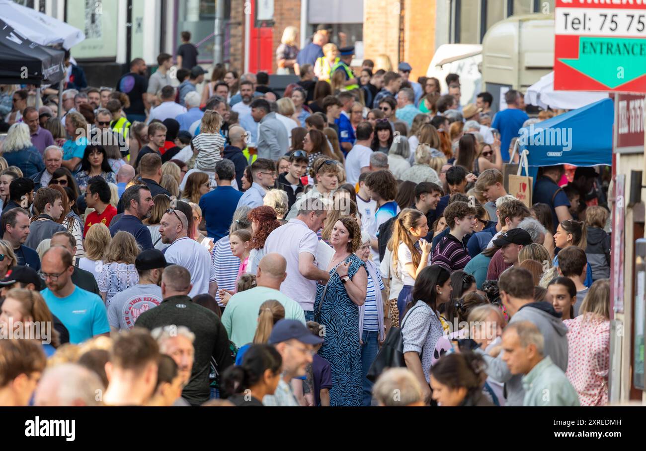 Hundreds of people in a crowded street in Lymm Village for Lymm ...