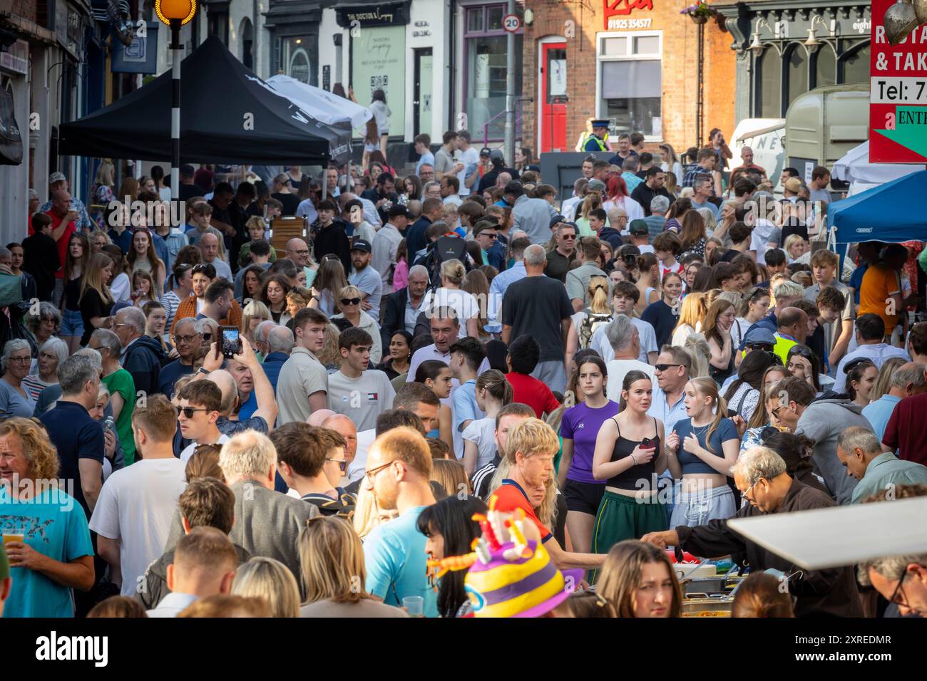 Hundreds of people in a crowded street in Lymm Village for Lymm ...