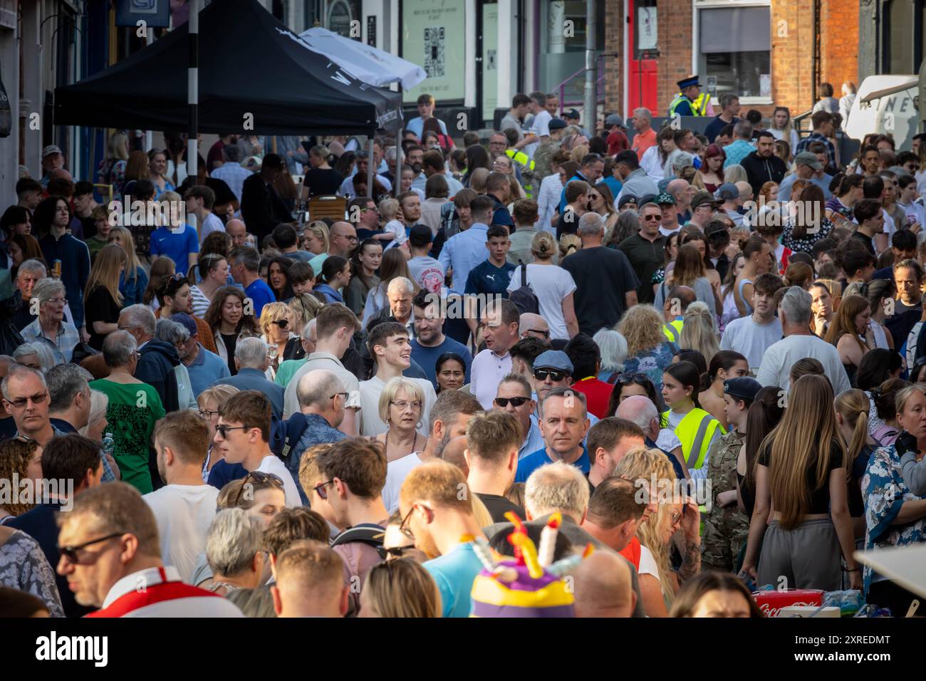 Hundreds of people in a crowded street in Lymm Village for Lymm ...