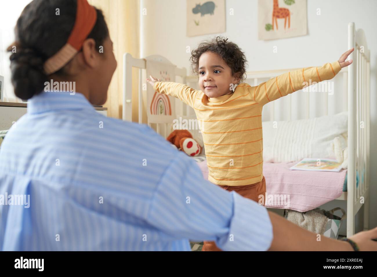 African american child reaching hi-res stock photography and images - Alamy